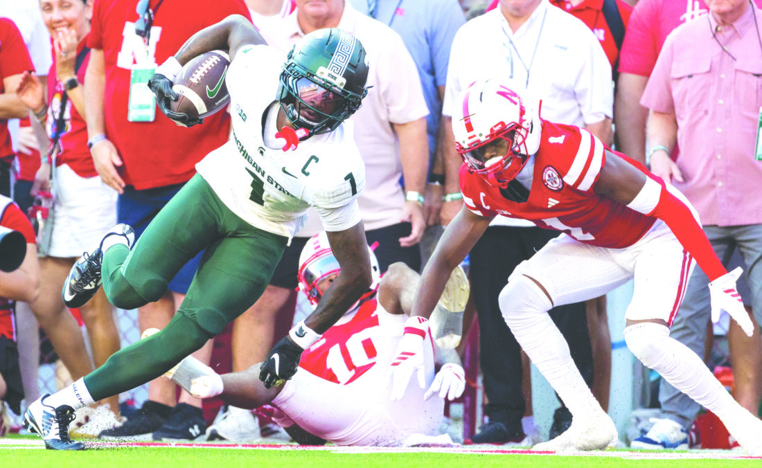 Cornhuskers outscore Spartans, 38-27 | News, Sports, Jobs - The Mining ...